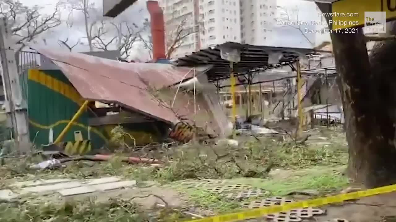 People Rescued from Roofs, Treetops After Powerful Typhoon Slams ...