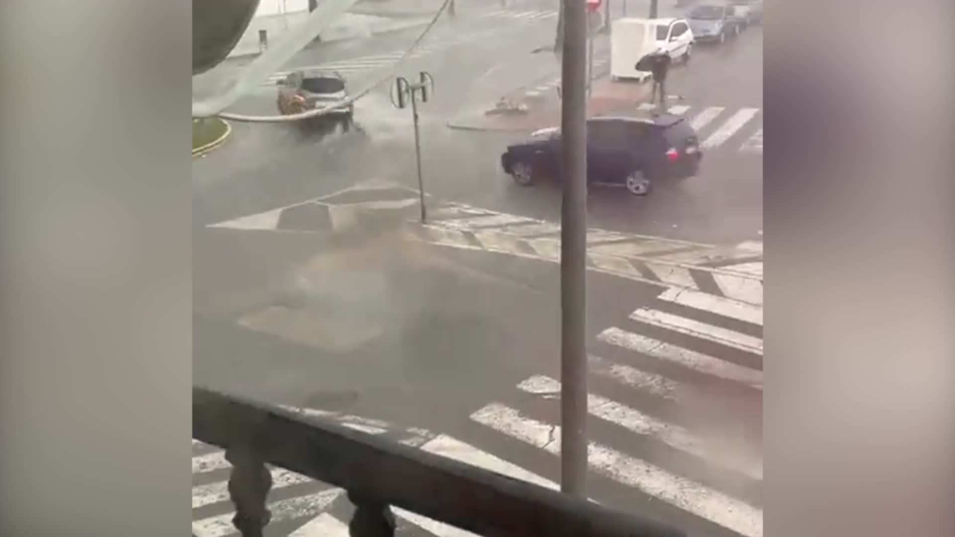 Harrowing Fall in a Windy Intersection - Videos from The Weather Channel