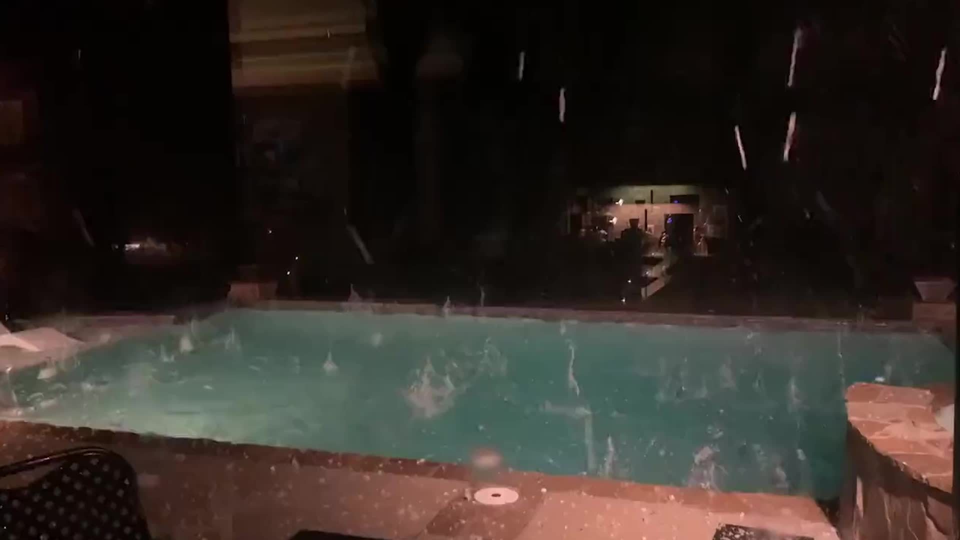 Watch Tennis Ball-Sized Hail Splash Down in Pool - Videos from The ...