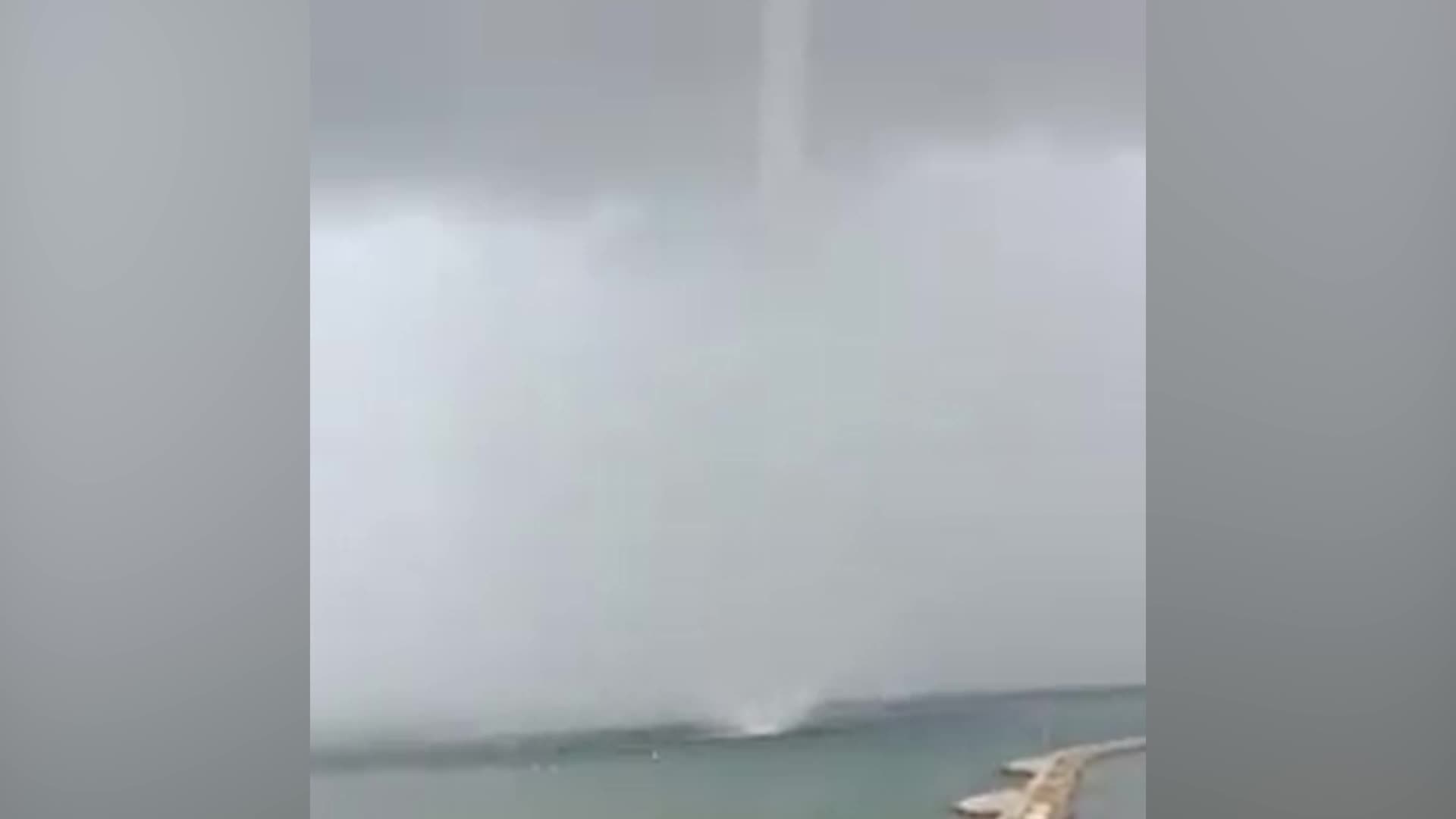 Waterspout Scrambles Beachgoers - Videos from The Weather Channel