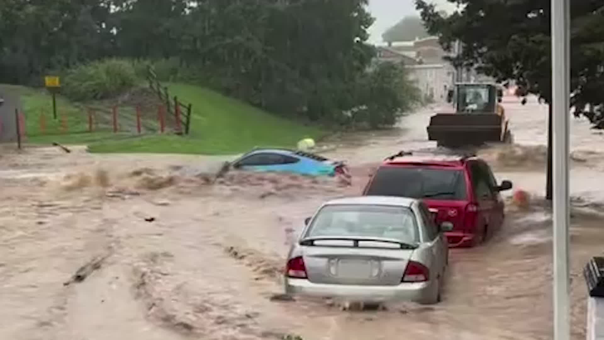Water Washes Away Car As Owner Watches - Videos from The Weather Channel