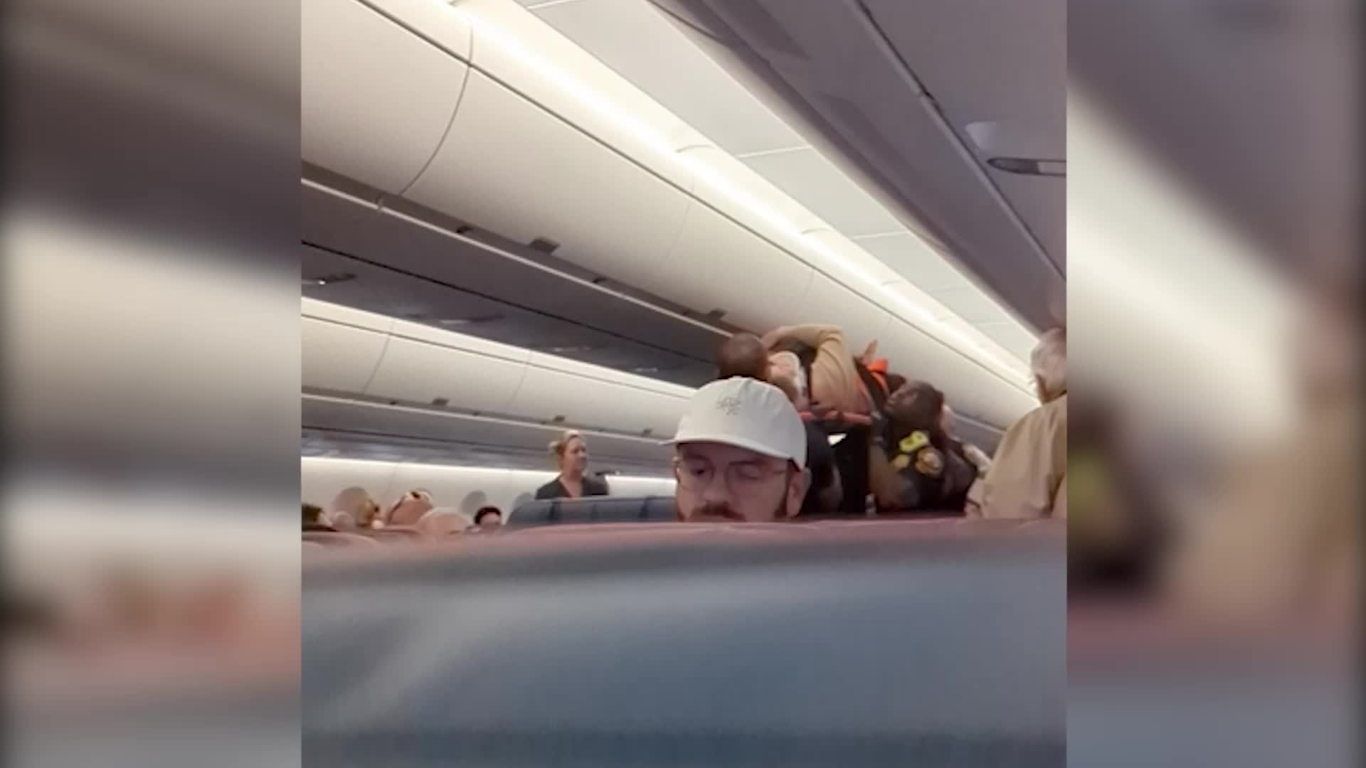 Passengers Leave Plane On Stretchers - Videos from The Weather Channel