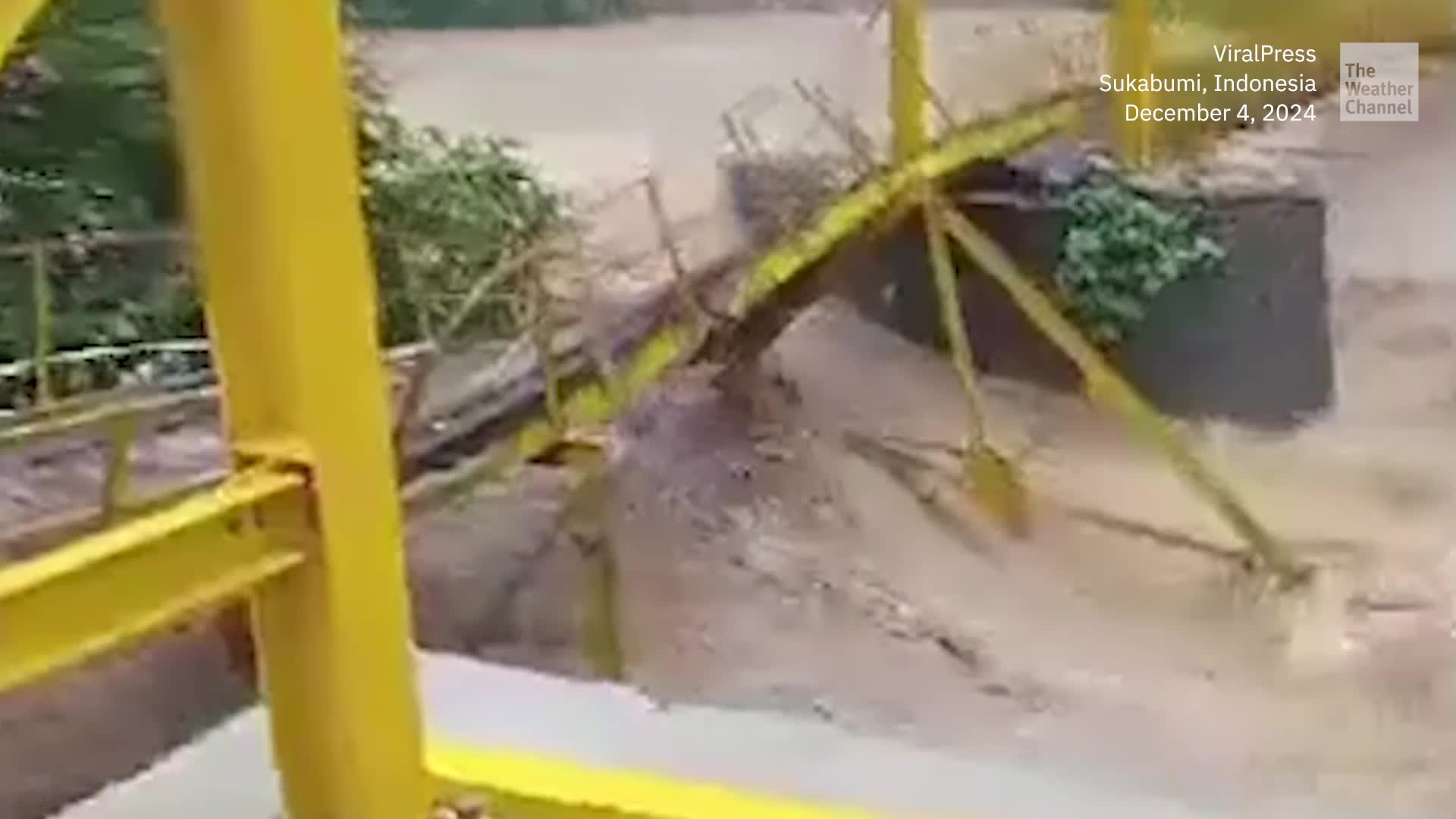 Floodwaters Rip Away Bridge In West Java - Videos from The Weather Channel